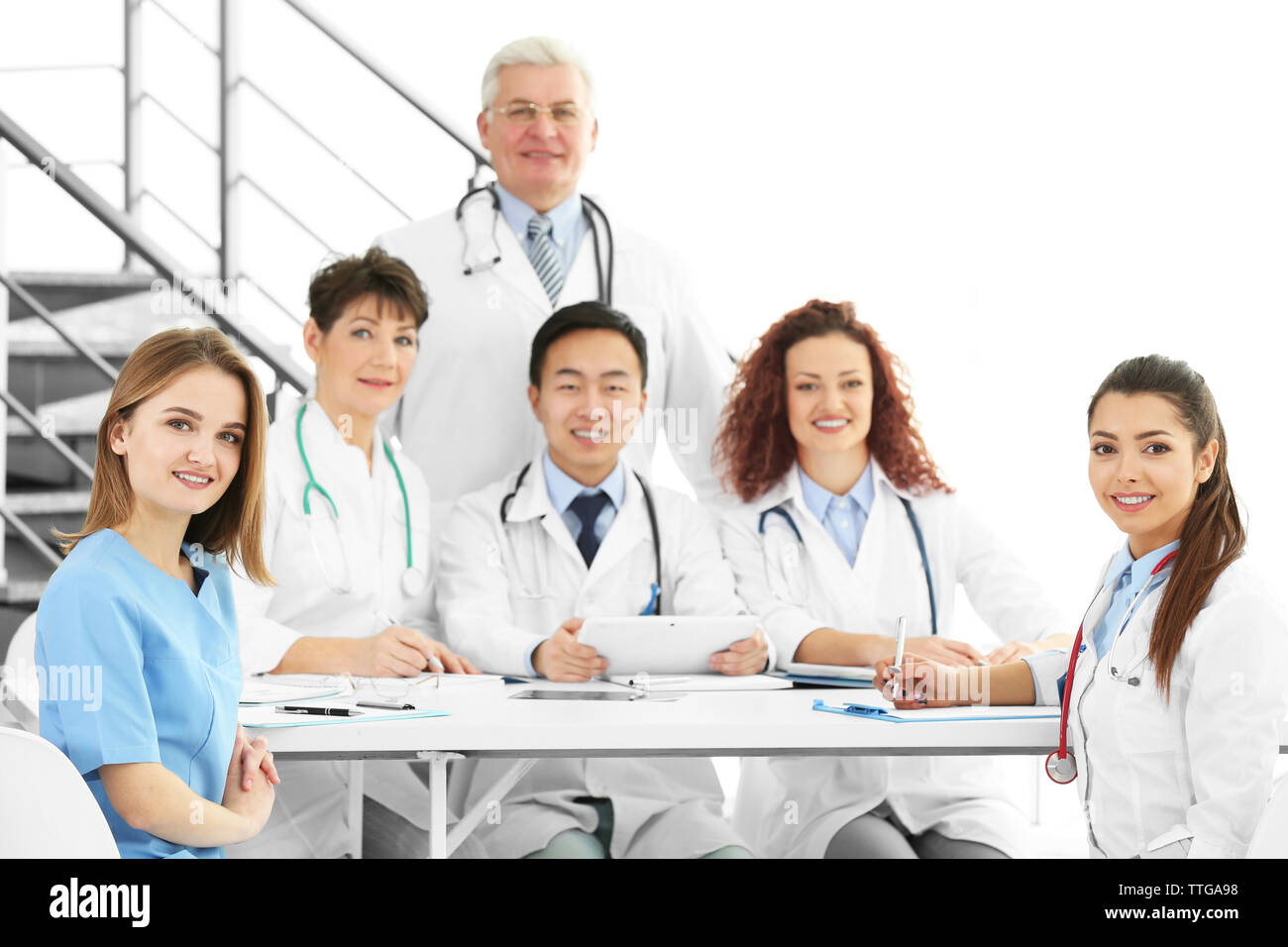 Team of doctors at working place indoors Stock Photo - Alamy