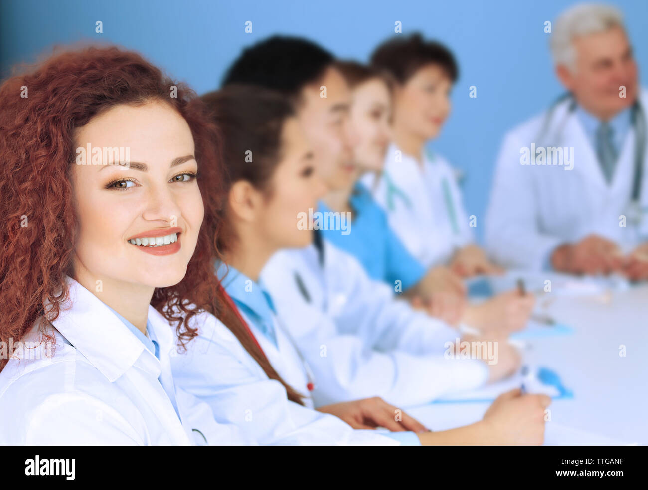 Team of doctors at working place indoors Stock Photo - Alamy