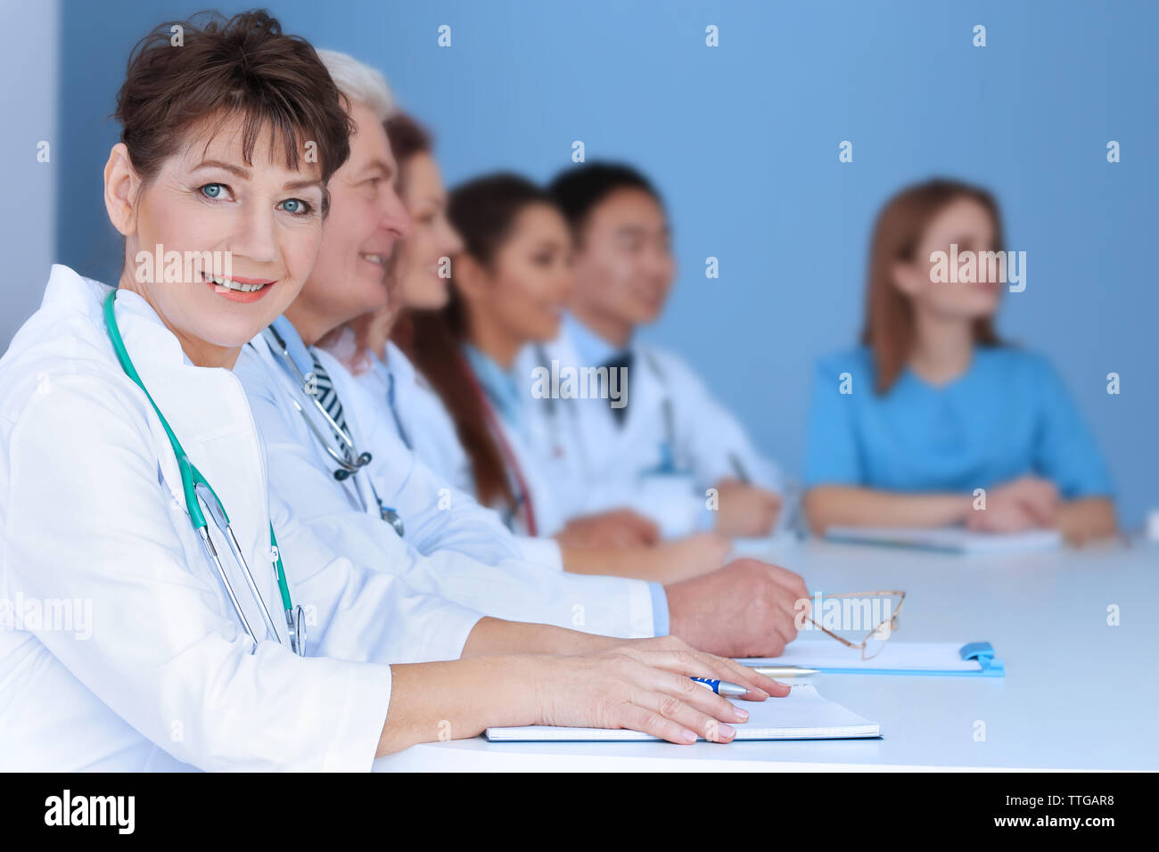 Team of doctors at working place indoors Stock Photo - Alamy