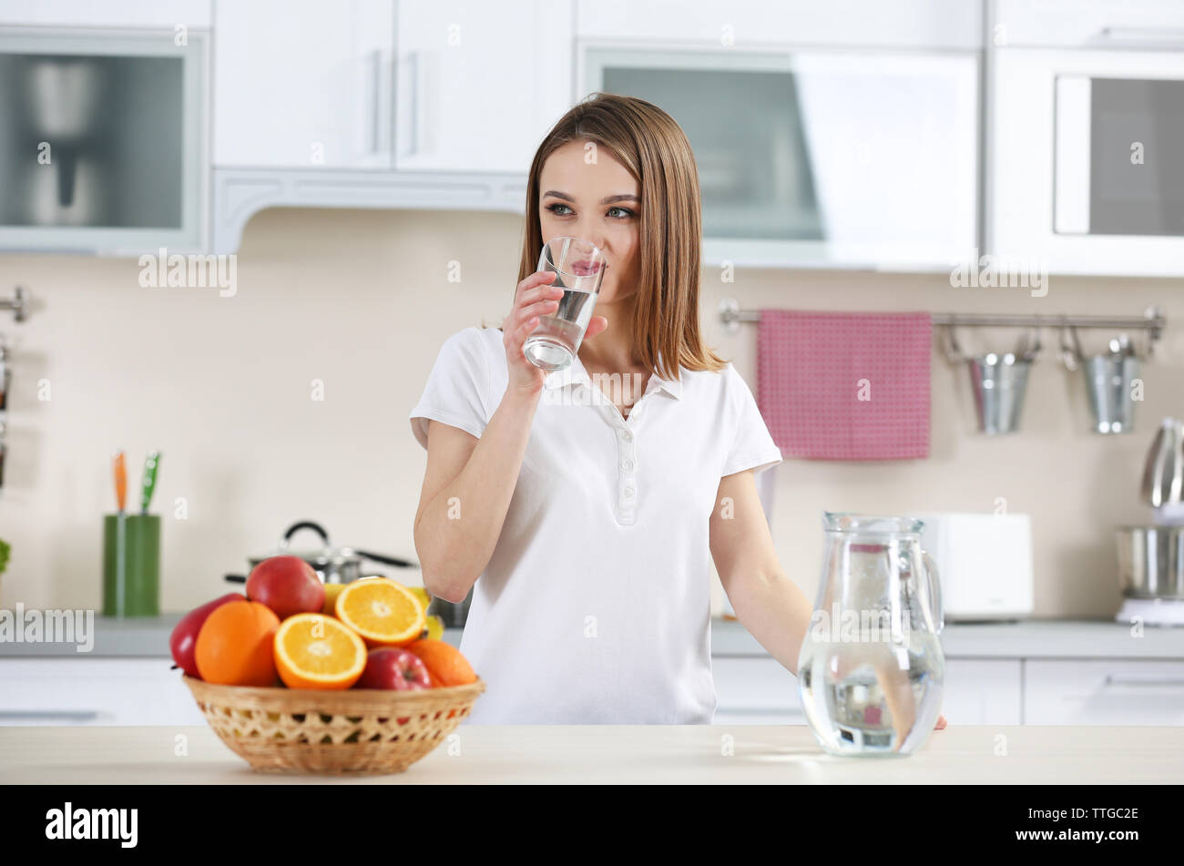 Woman Drinking Water Kitchen