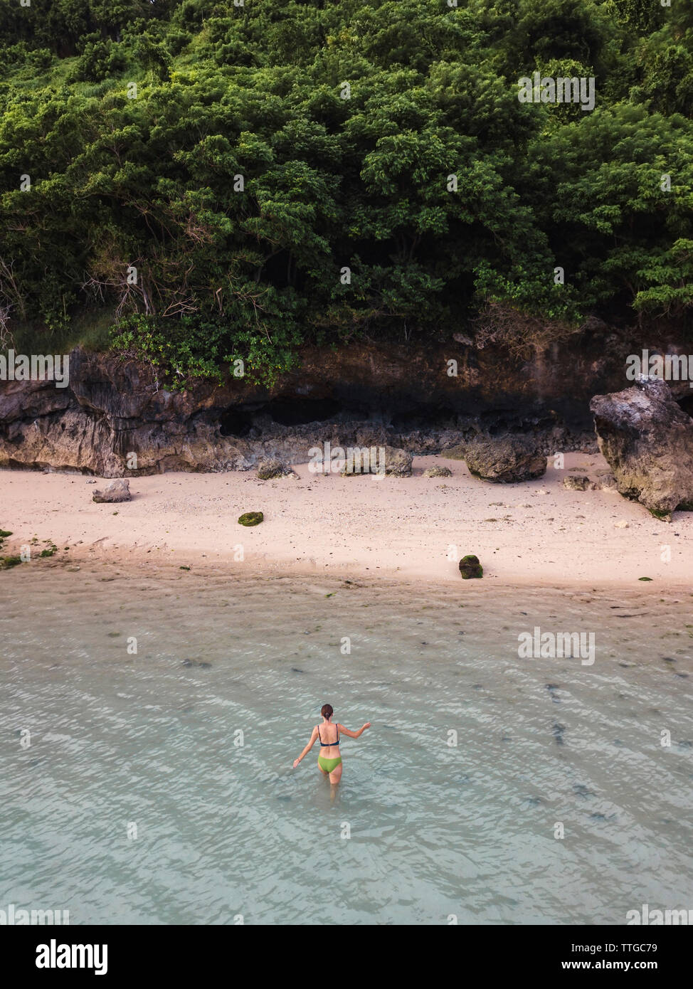 Woman bikini on beach alone hi-res stock photography and images - Alamy