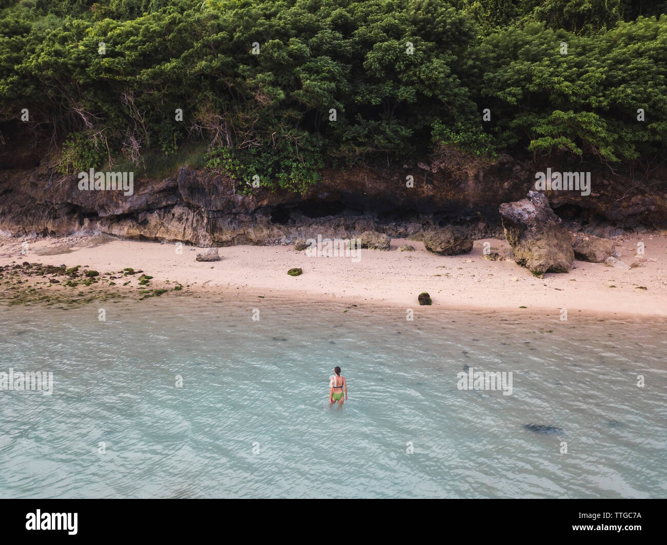Woman bikini on beach alone hi-res stock photography and images - Alamy