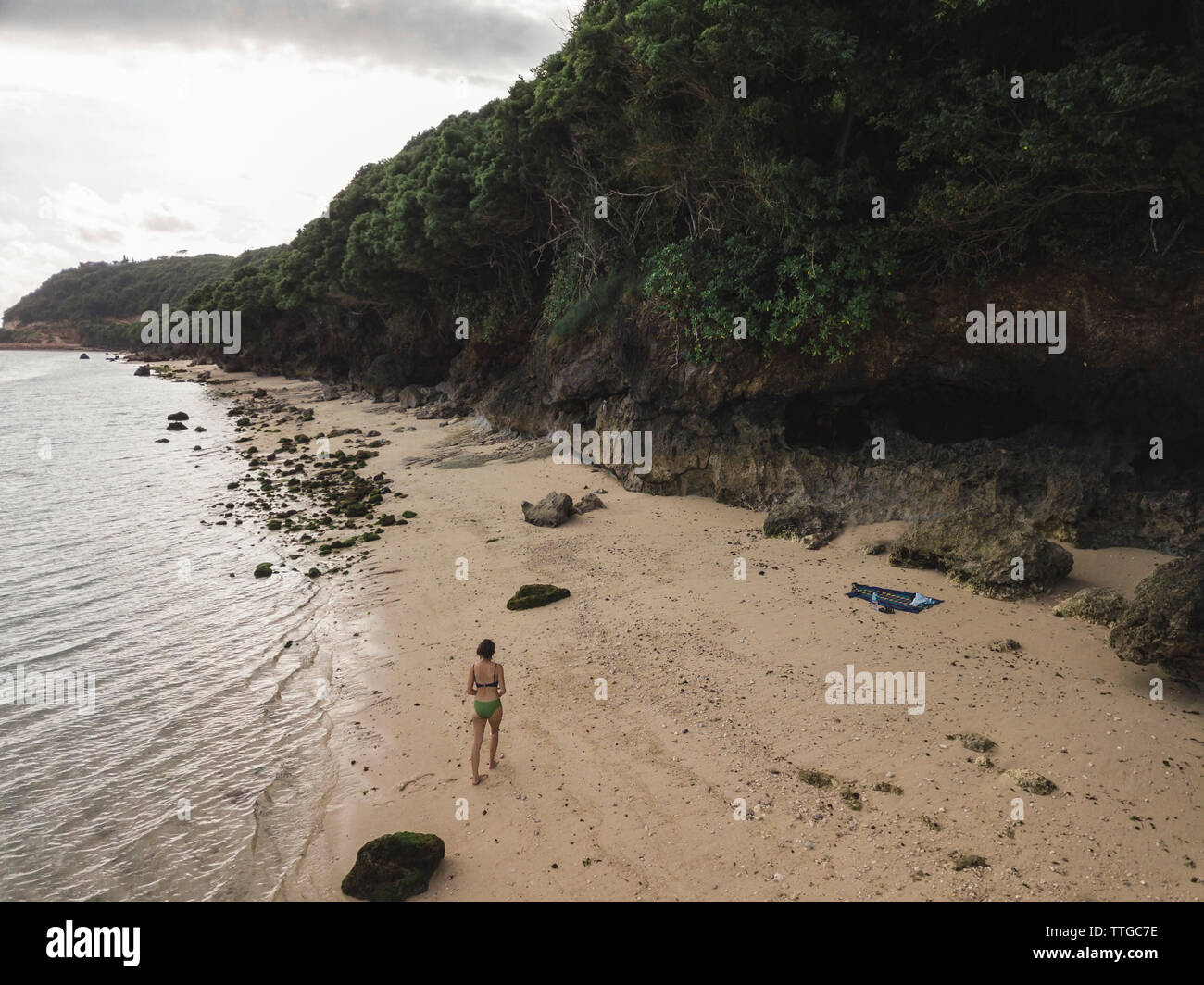 Woman bikini on beach alone hi-res stock photography and images - Alamy
