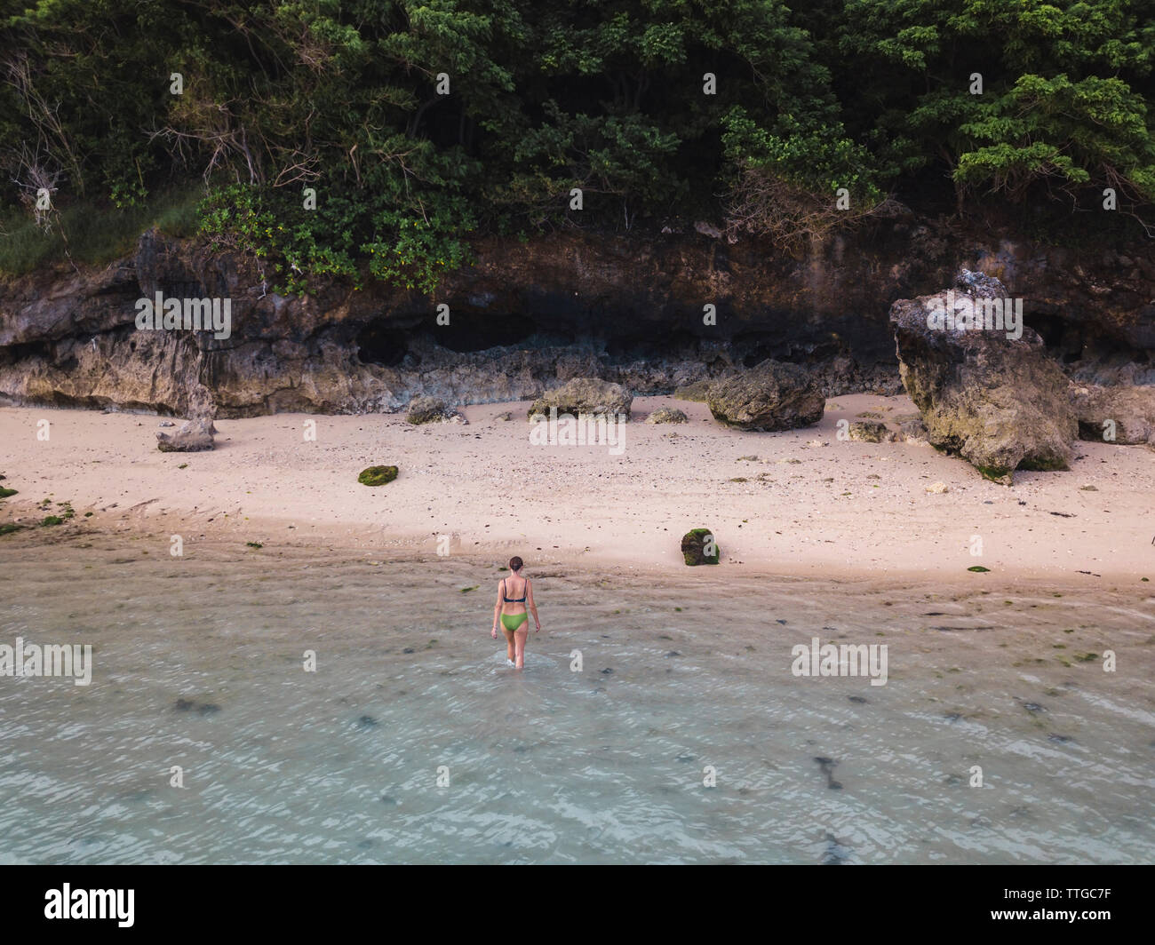 Woman bikini on beach alone hi-res stock photography and images - Alamy