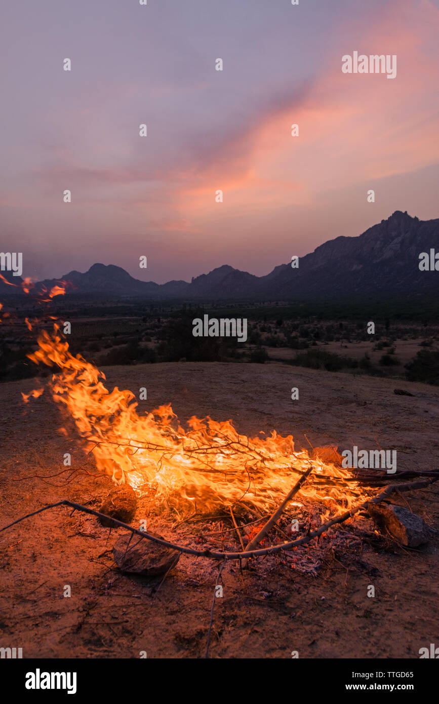 Fire at Sunset Stock Photo - Alamy