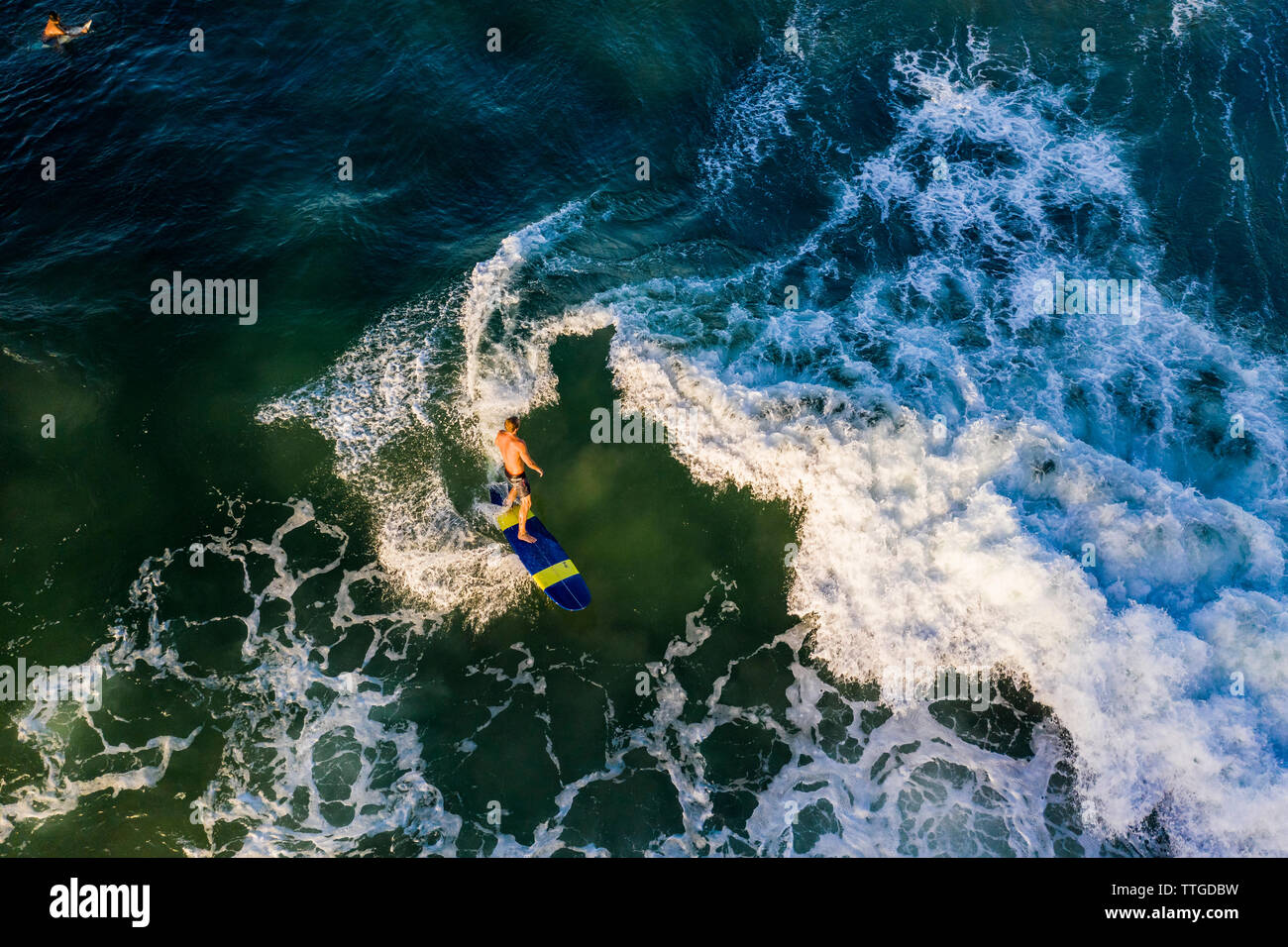 Aerial view of surfer and wave from above in Australia Stock Photo - Alamy