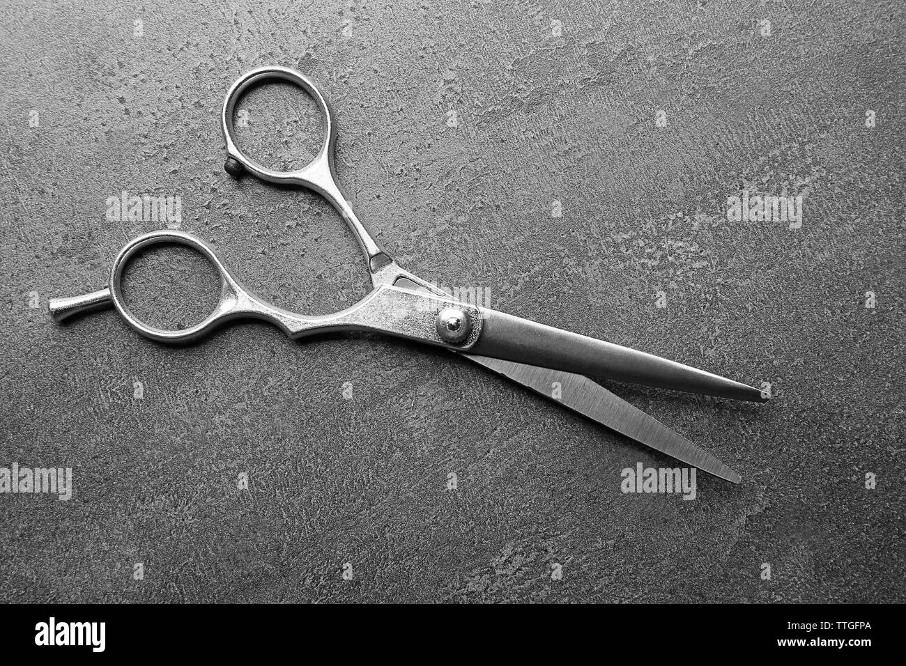 Professional metal scissors on a dark grey surface, top view Stock ...