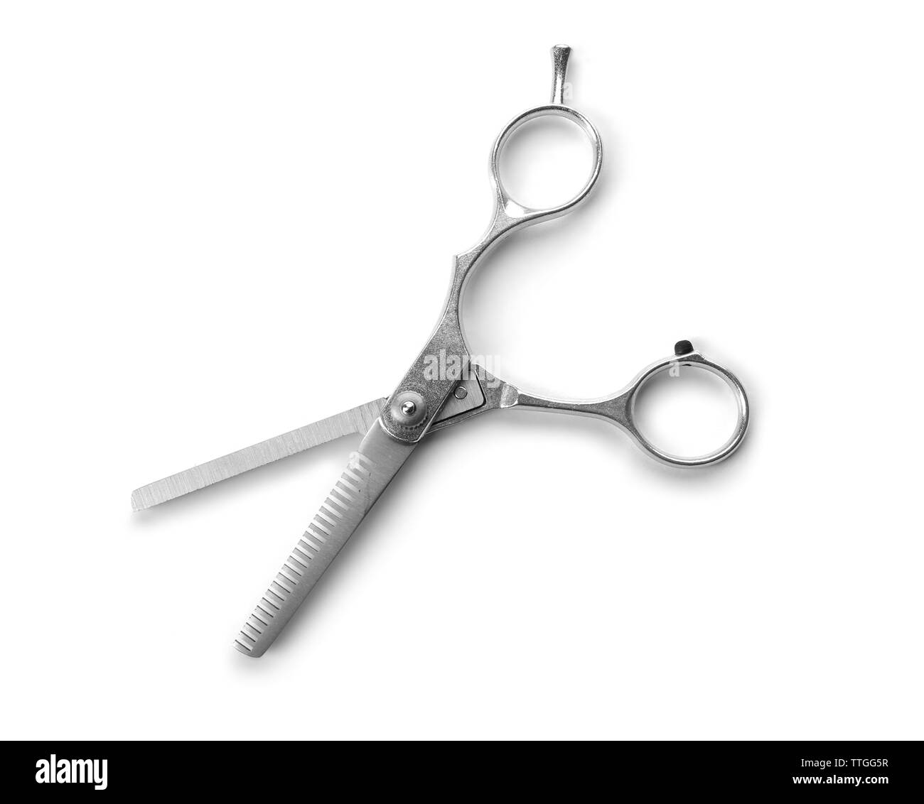 Professional metal scissors in open position isolated on white ...