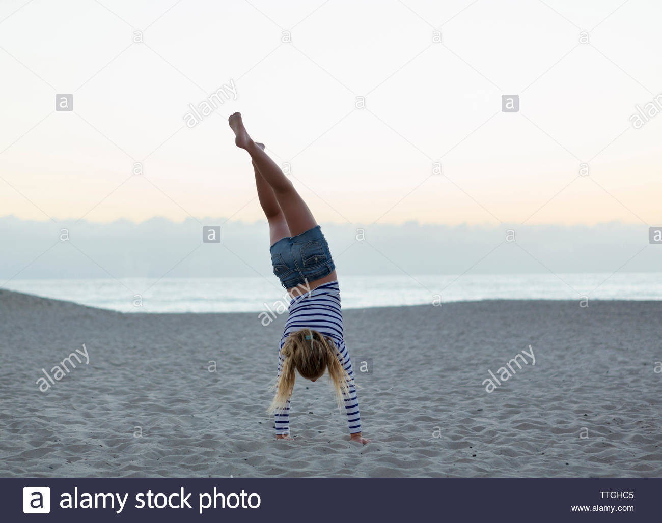 Girl Doing Handstand High Resolution Stock Photography and Images - Alamy