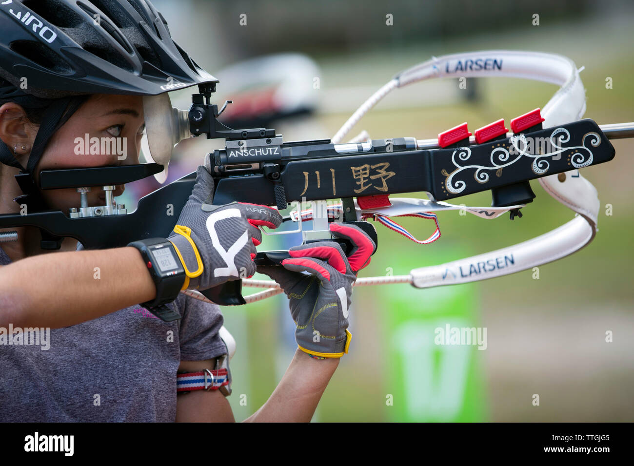 Female Biathlete during target practice Stock Photo - Alamy
