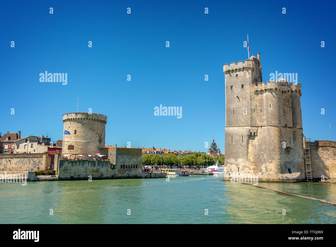 Medieval towers at the entrance of the port of La Rochelle, France ...