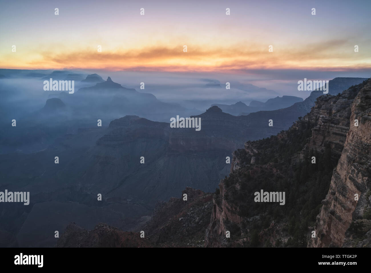 View of the Grand Canyon from the east side with fog Stock Photo - Alamy