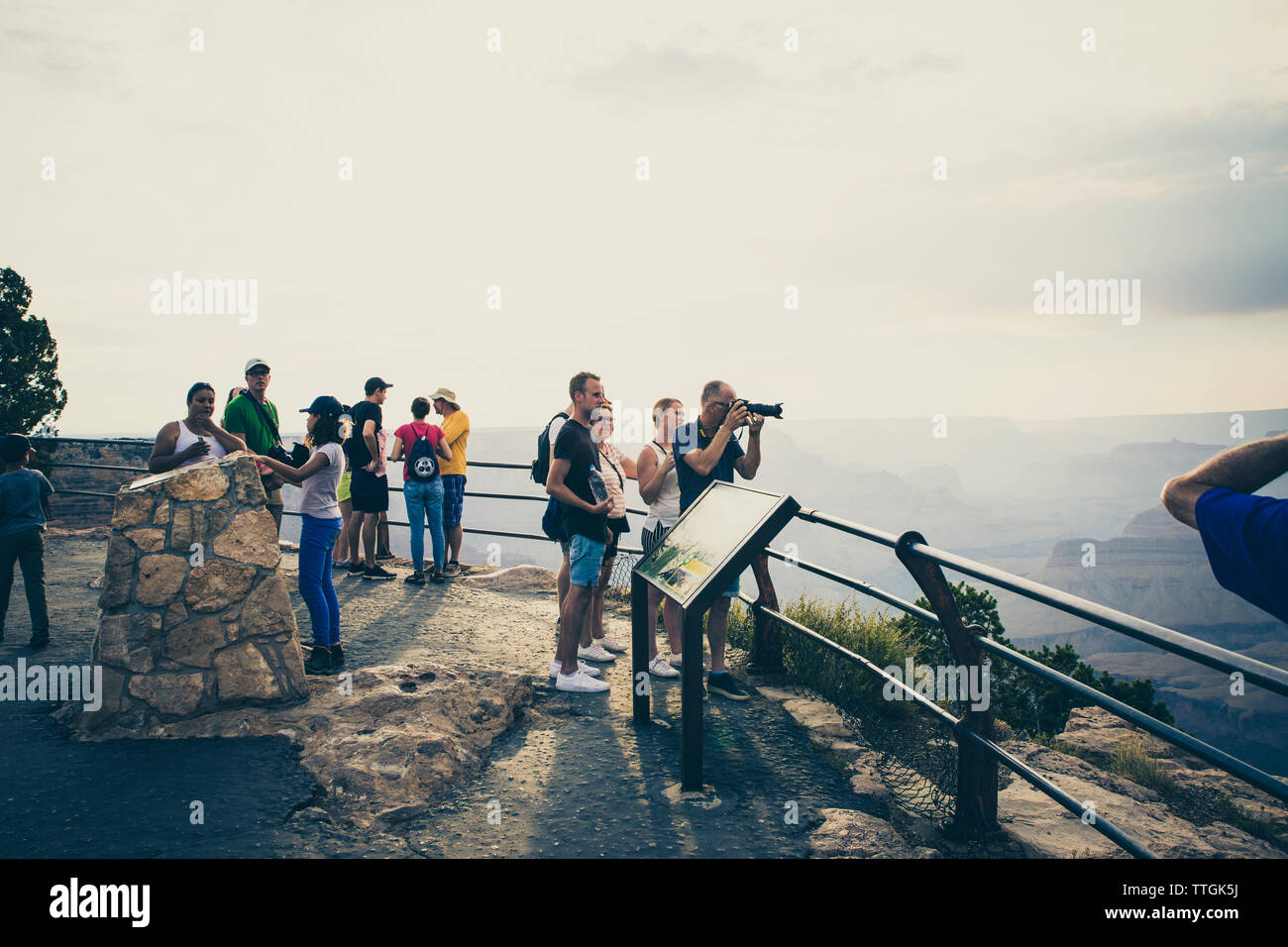 People photographing in a viewpoint of the Grand Canyon Stock Photo - Alamy