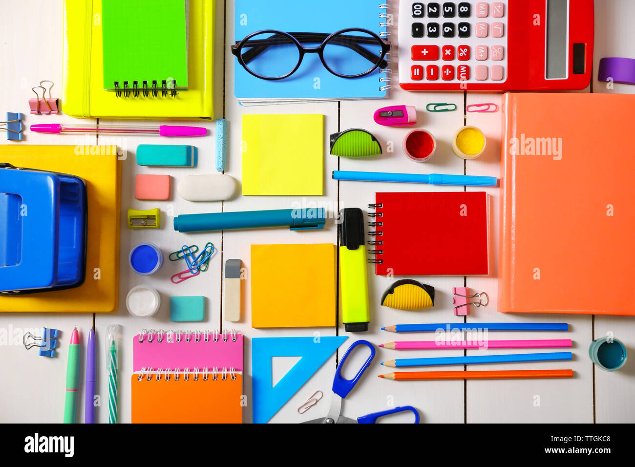 Flat lay of stationery on white wooden table background Stock Photo - Alamy