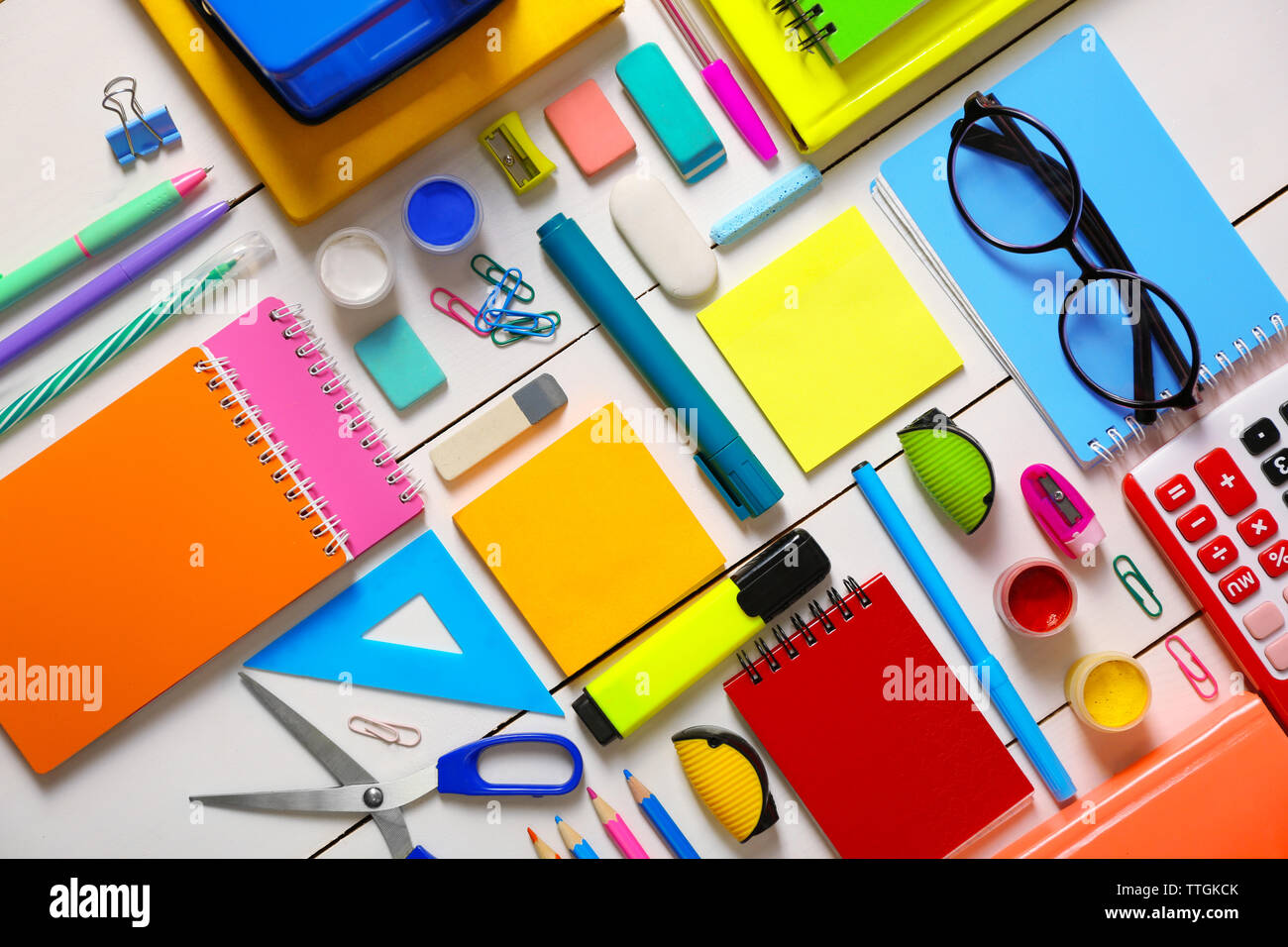 Flat lay of stationery on white wooden table background Stock Photo - Alamy