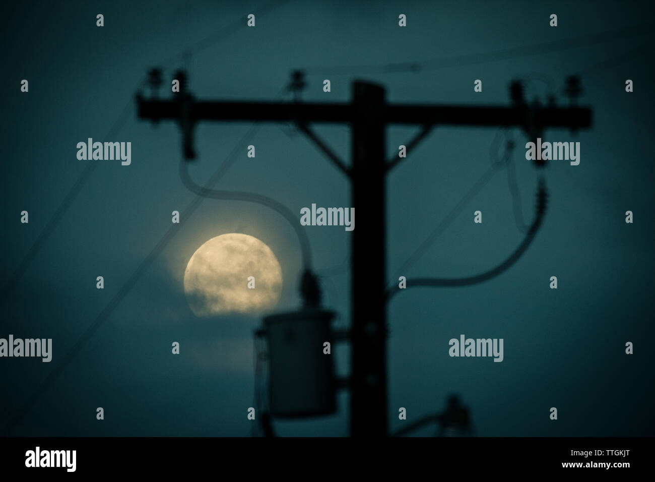 Power pole with full moon hi-res stock photography and images - Alamy