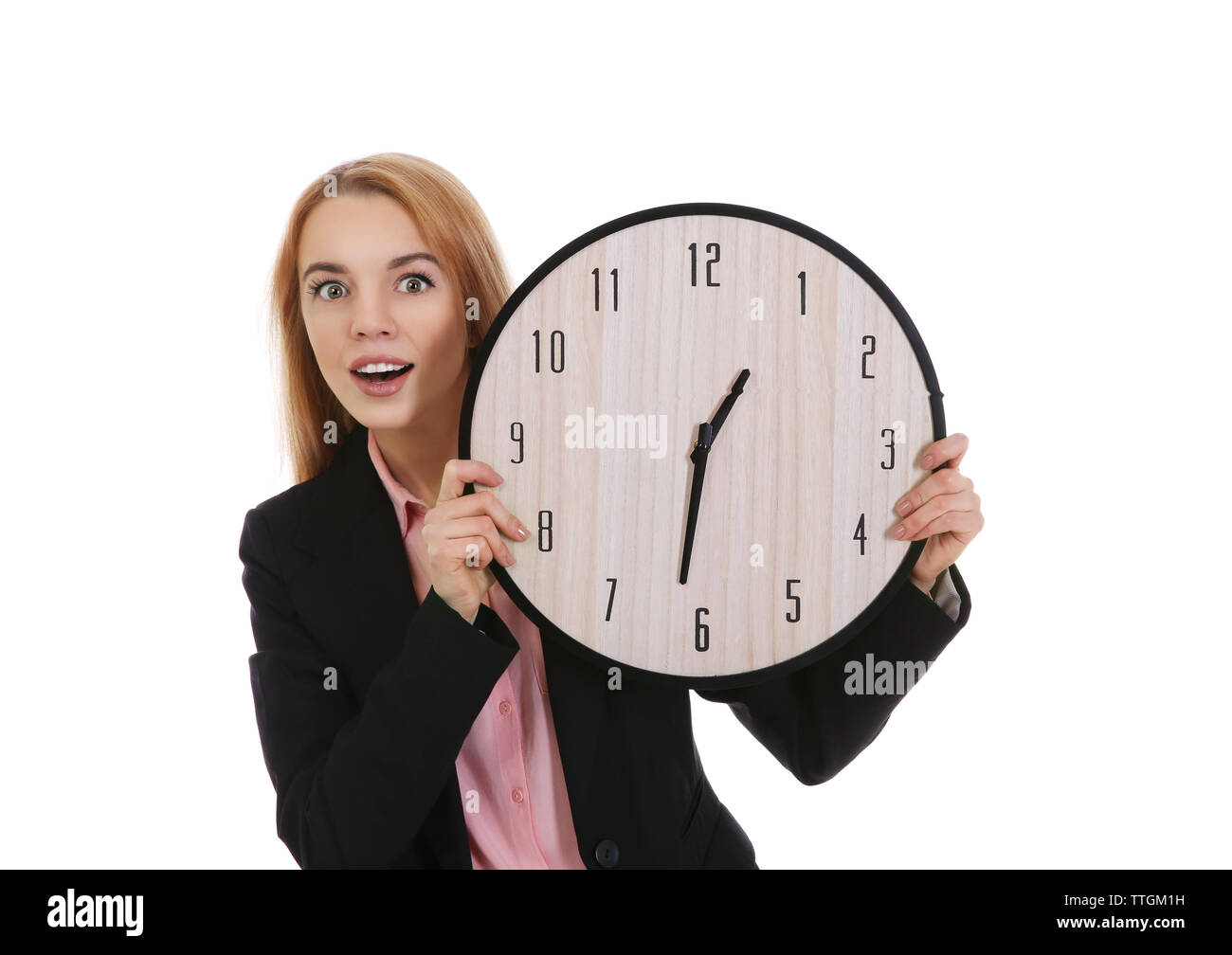 Beautiful young girl holding clock, isolated on white Stock Photo - Alamy