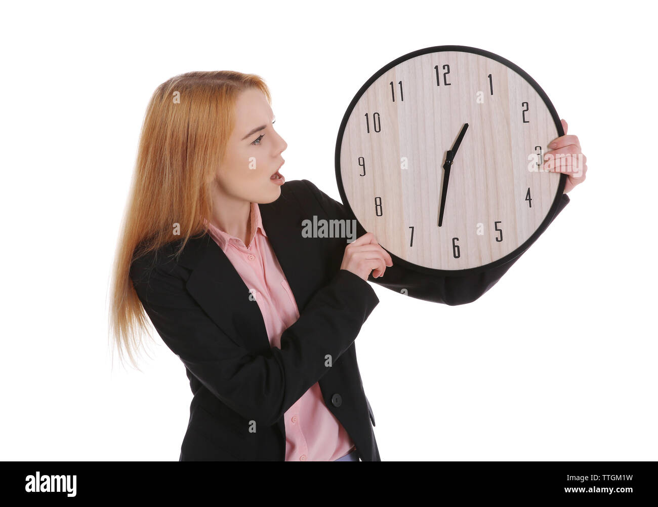 Beautiful young girl holding clock, isolated on white Stock Photo - Alamy