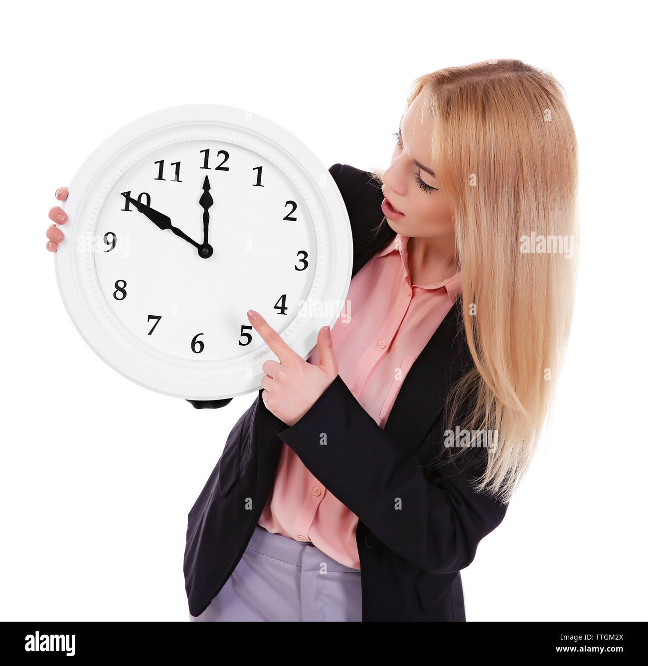 Beautiful young girl holding clock, isolated on white Stock Photo - Alamy