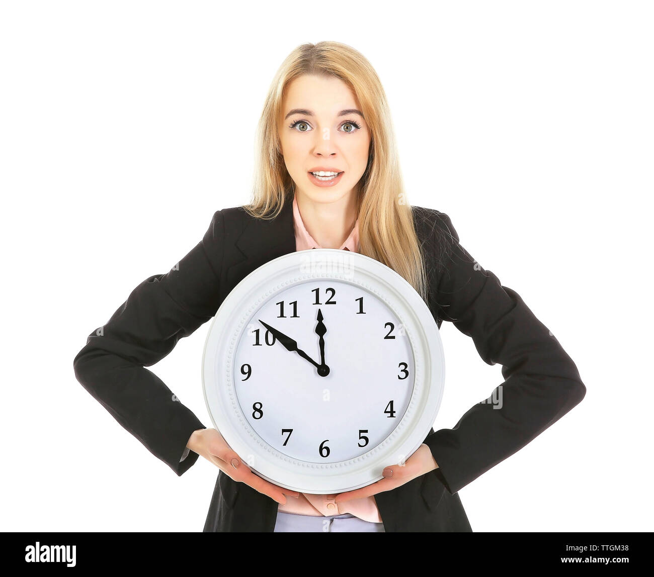 Beautiful young girl holding clock, isolated on white Stock Photo - Alamy