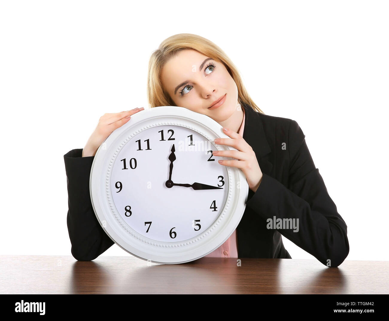 Beautiful young girl holding clock, isolated on white Stock Photo - Alamy