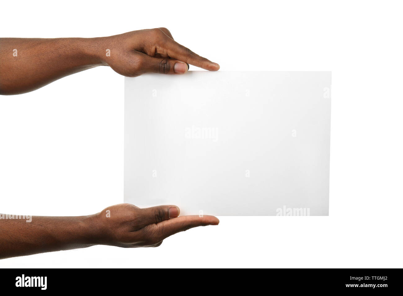 Male hands holding sheet of paper isolated on white Stock Photo - Alamy
