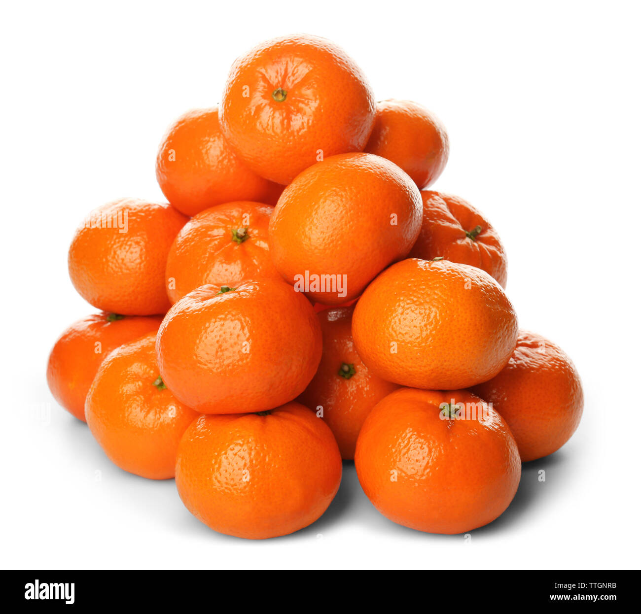 A pile of fresh tangerines isolated on white background, close up Stock ...