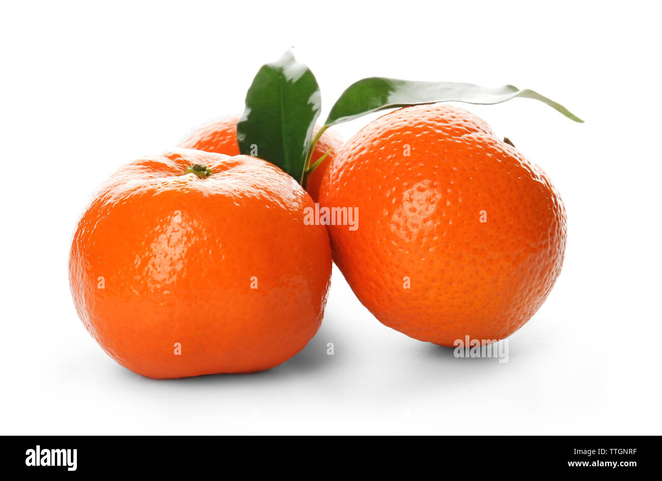 Three fresh tangerines isolated on white background, close up Stock ...