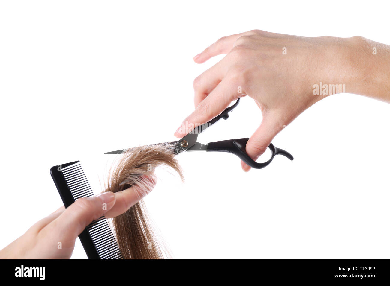 Hairdresser's hands with scissors hi-res stock photography and images ...
