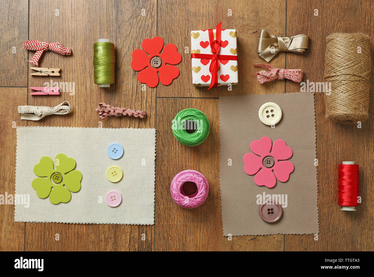 Sewing creative accessories on wooden table, top view Stock Photo - Alamy