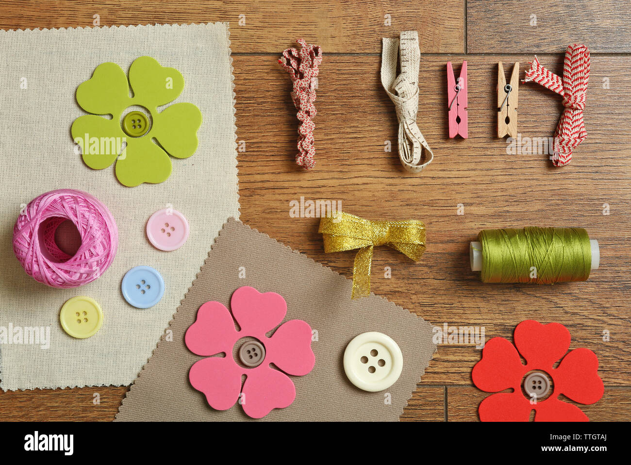 Sewing creative accessories on wooden table, top view Stock Photo - Alamy