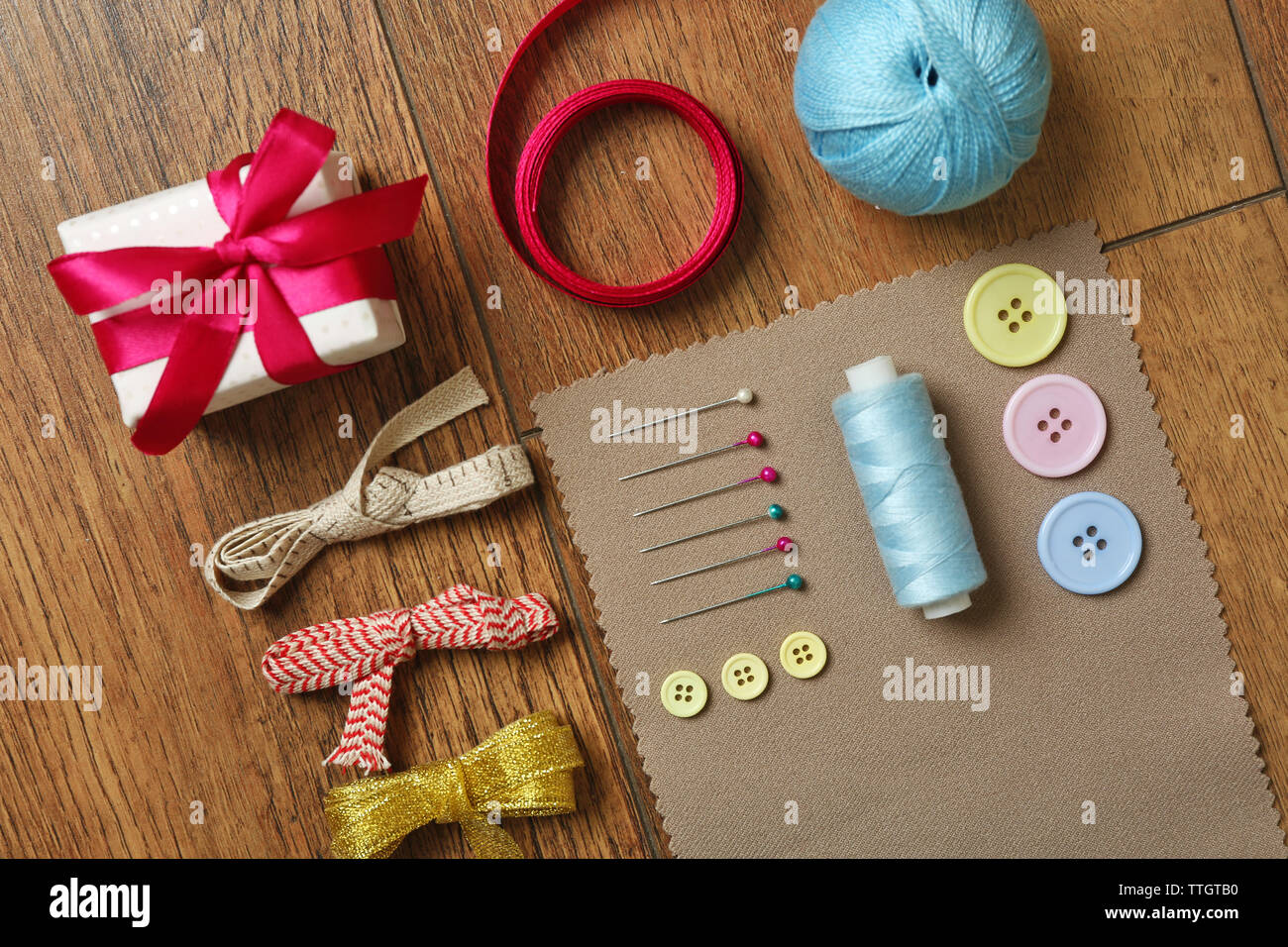 Sewing creative accessories on wooden table, top view Stock Photo - Alamy