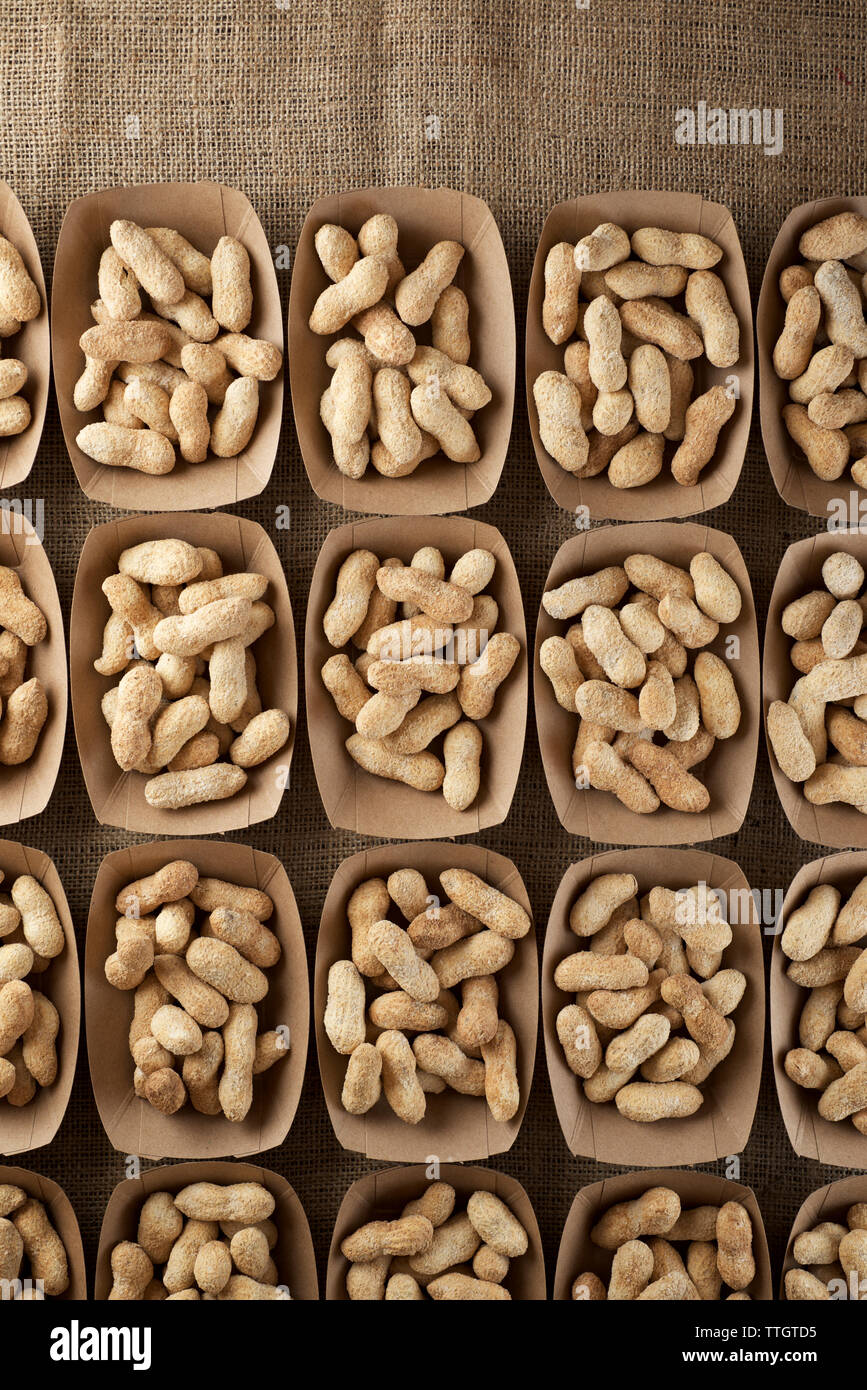 Peanuts with shell in disposable cardboard boxes Stock Photo - Alamy