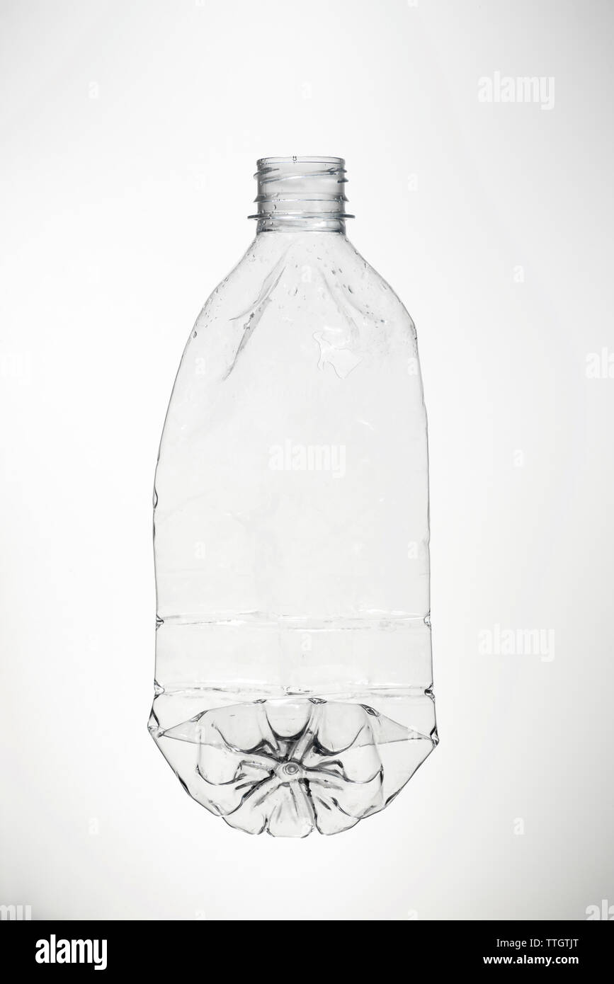 Used water bottle and white background Stock Photo - Alamy