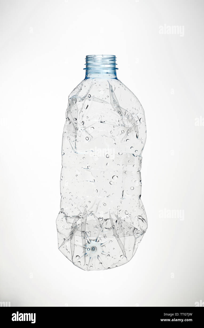 Used water bottle and white background Stock Photo - Alamy