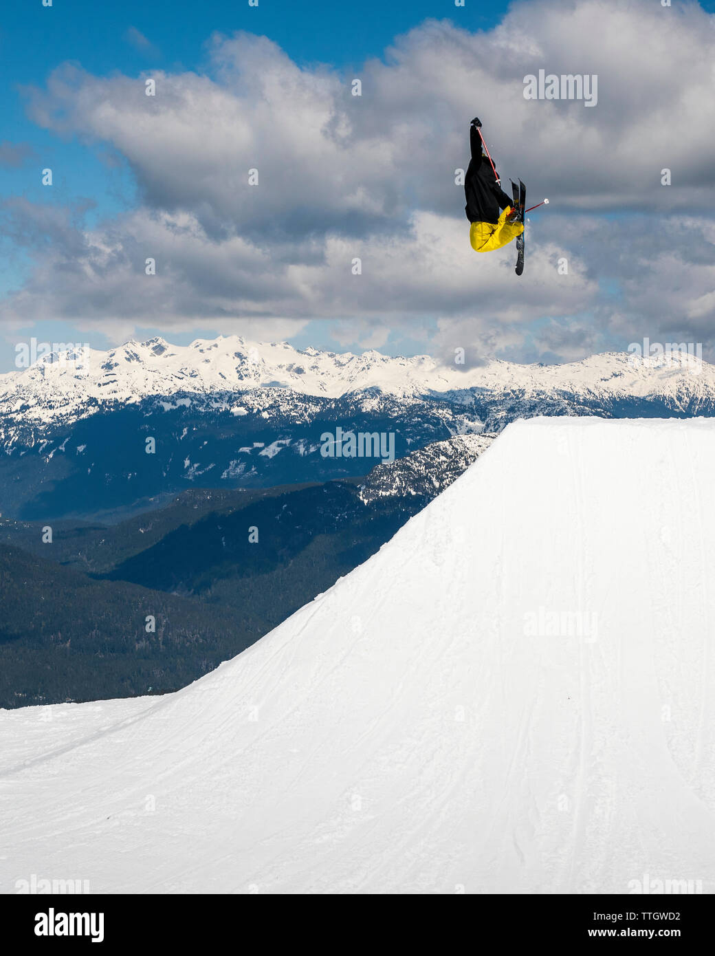 A man hits a jump on skis in the terrain park at Whistler Blackcomb ...