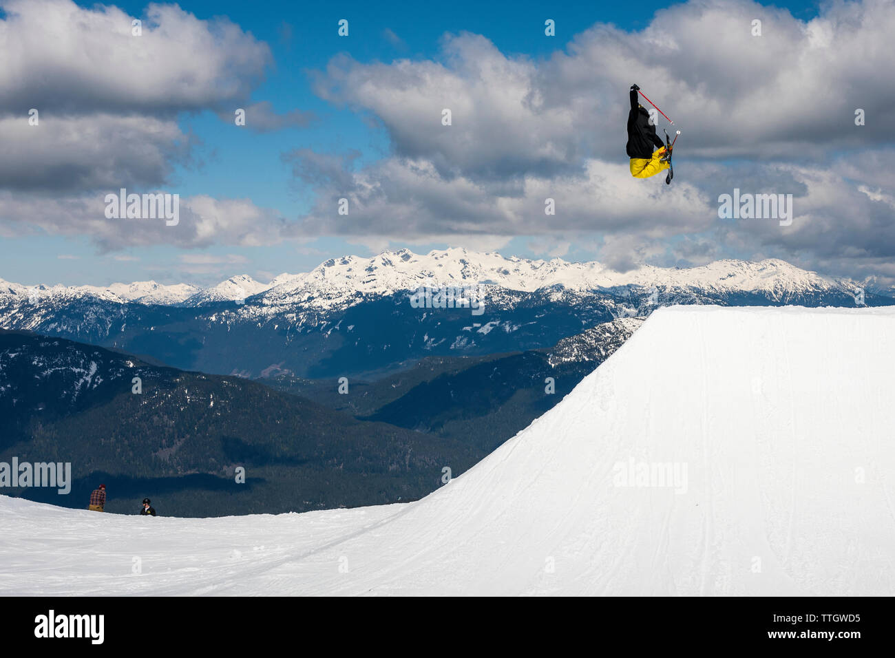 A man hits a jump on skis in the terrain park at Whistler Blackcomb ...