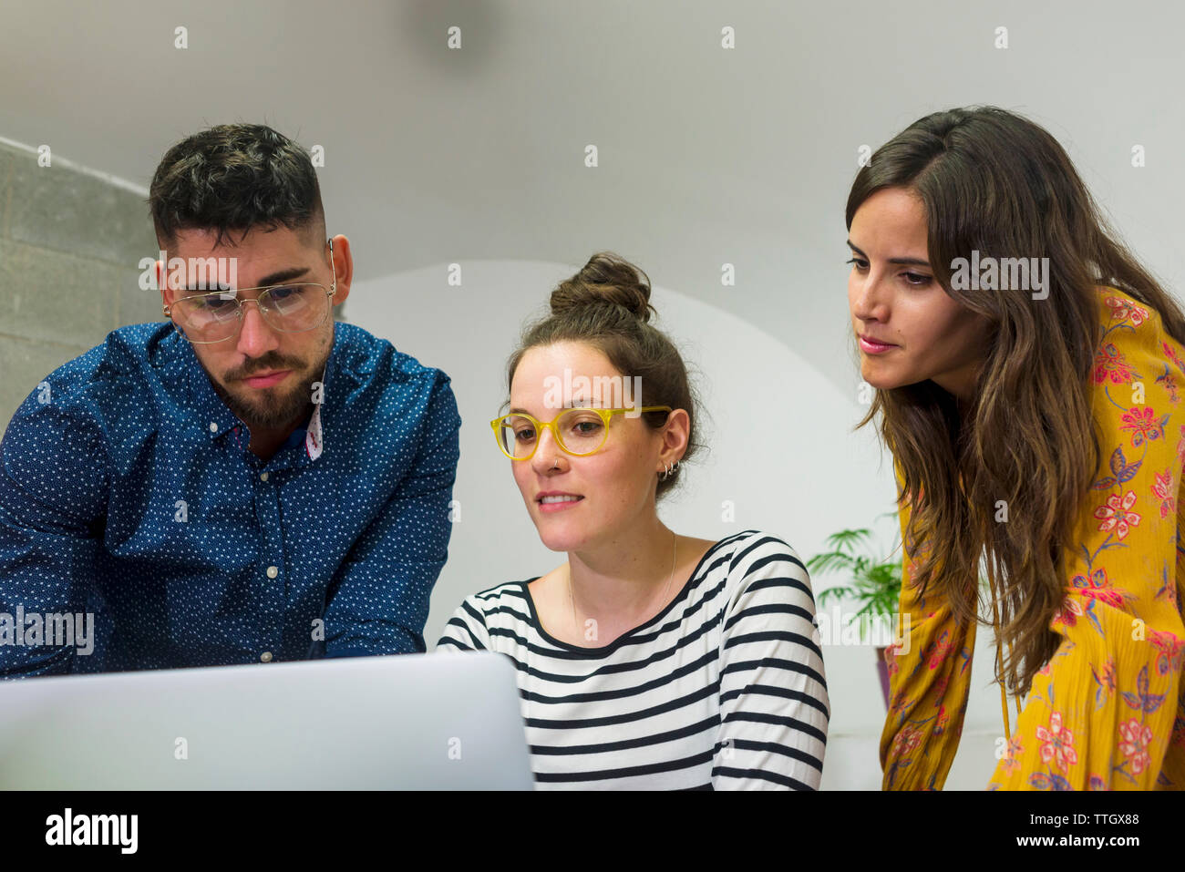 Group people laptop front view hi-res stock photography and images - Alamy