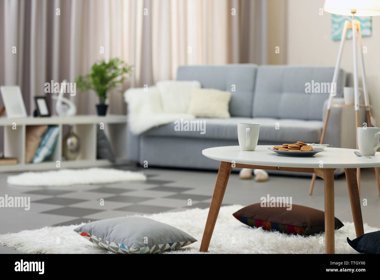 Stylish comfortable living room Stock Photo - Alamy
