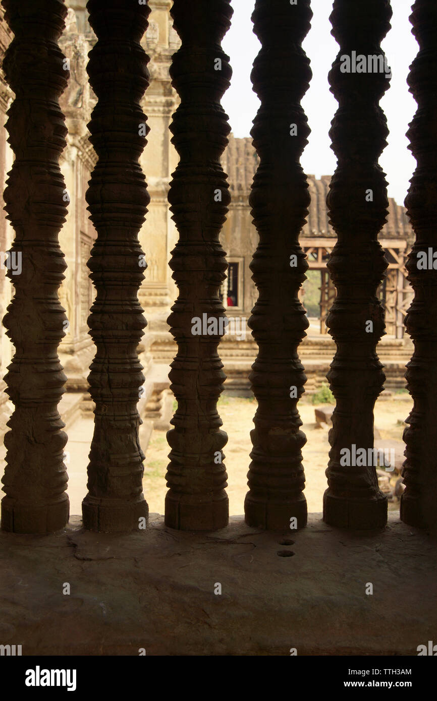 Silhouette of columns from inside central temple of Angkor Wat Stock ...