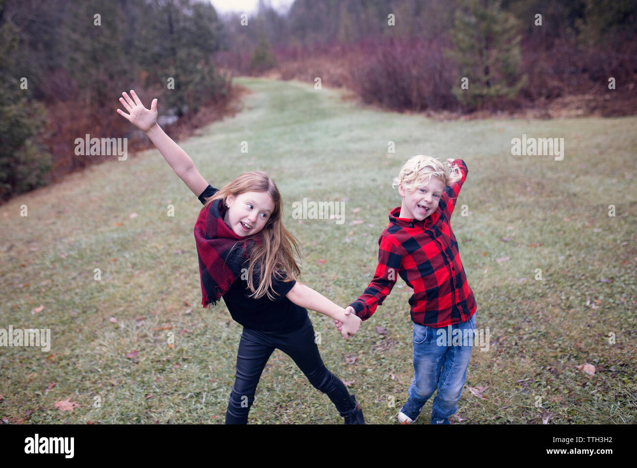 Family in Matching Red Plaid Stock Photo - Alamy