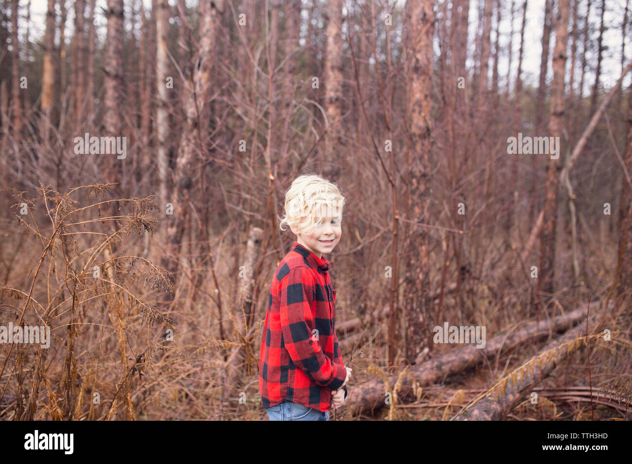Boy Walking on a Log Stock Photo - Alamy