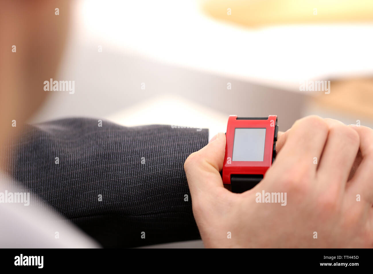 Man wearing suit checking watch hi-res stock photography and images - Alamy
