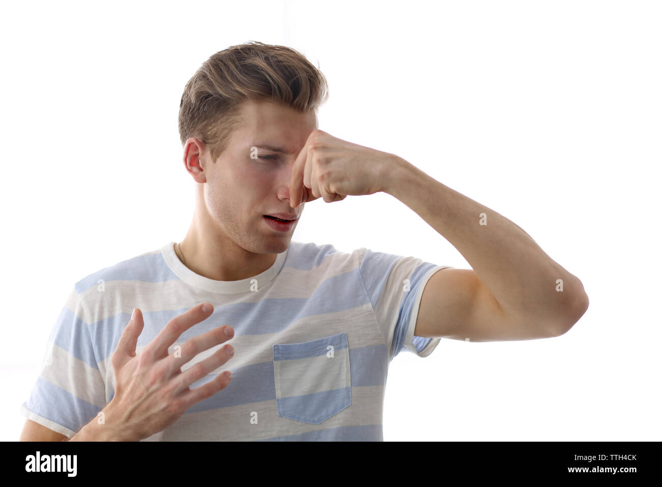 Pinching her nose hi-res stock photography and images - Alamy