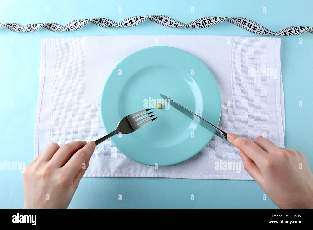 Hands Holding Knife And Fork Stock Photos & Hands Holding Knife And ...