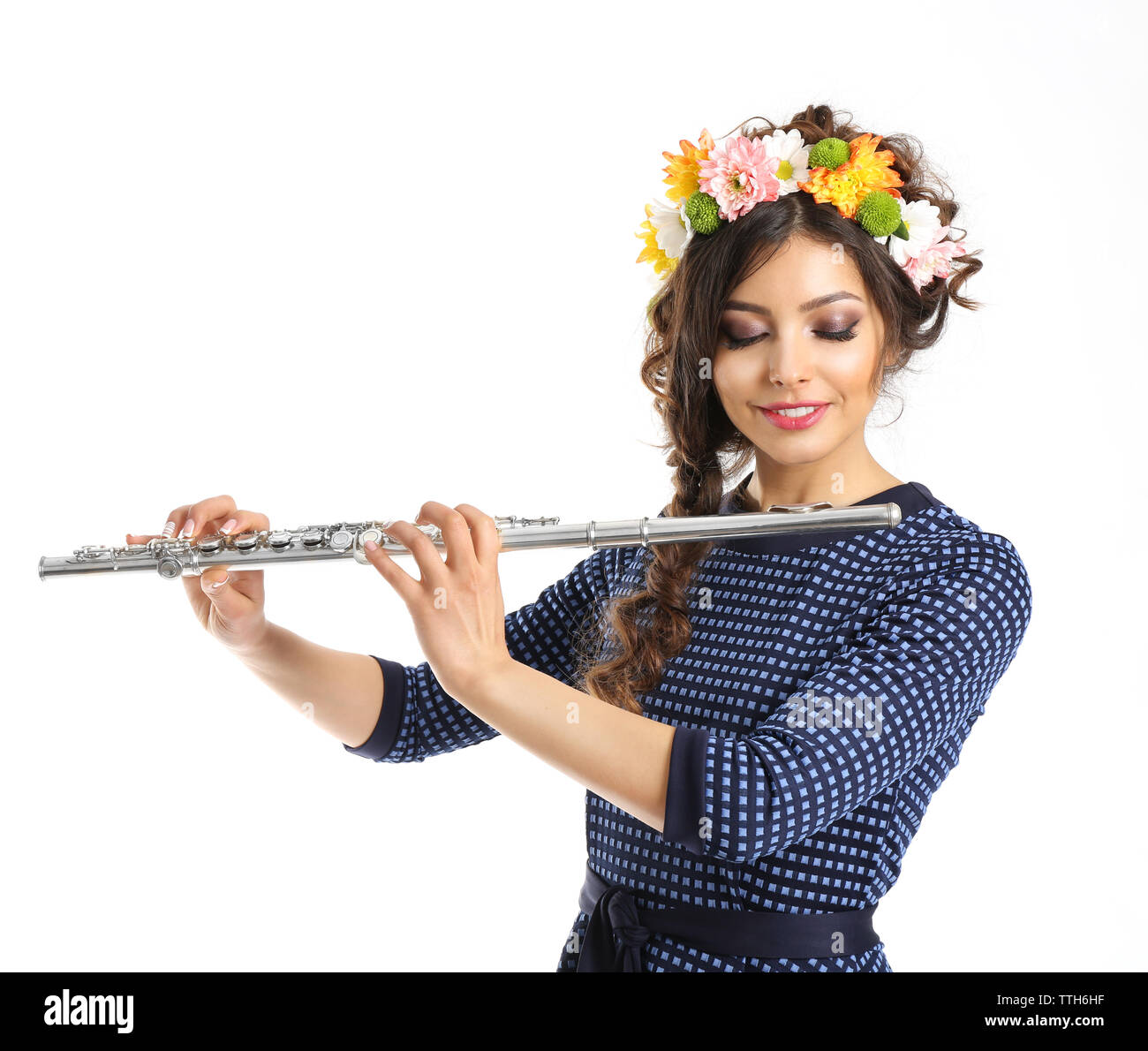 Beautiful young woman with flute isolated on white Stock Photo - Alamy