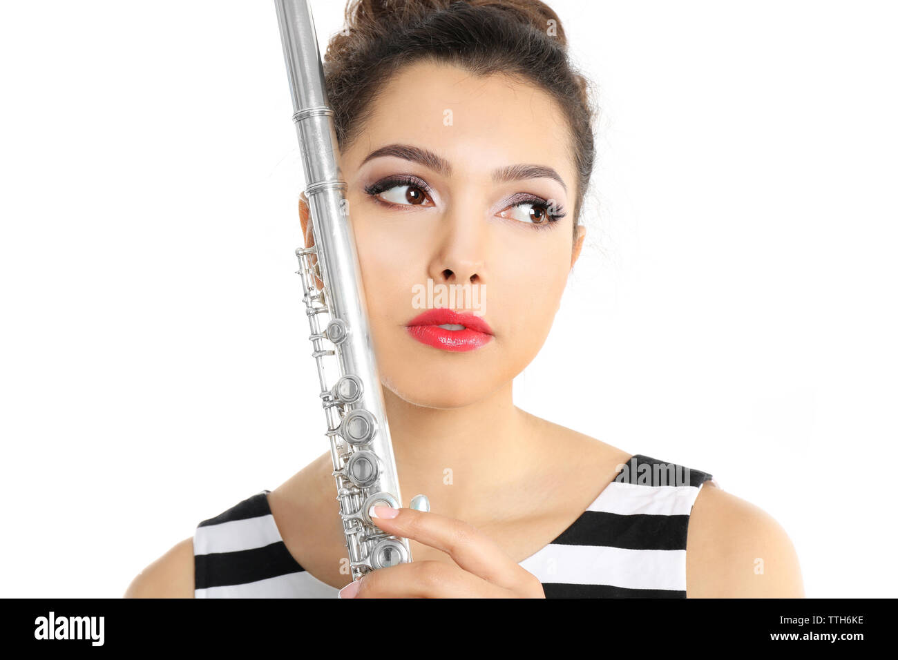 Beautiful young woman with flute isolated on white Stock Photo - Alamy