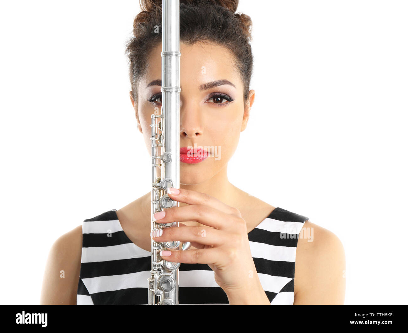 Beautiful young woman with flute isolated on white Stock Photo - Alamy