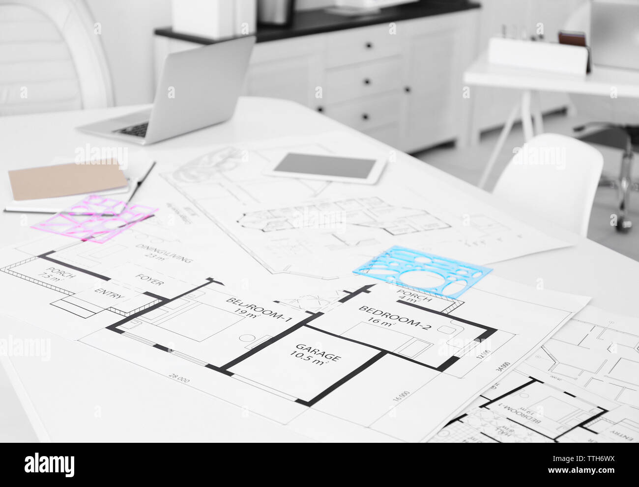 Table of architect with drafts and clipboard in the office Stock Photo ...