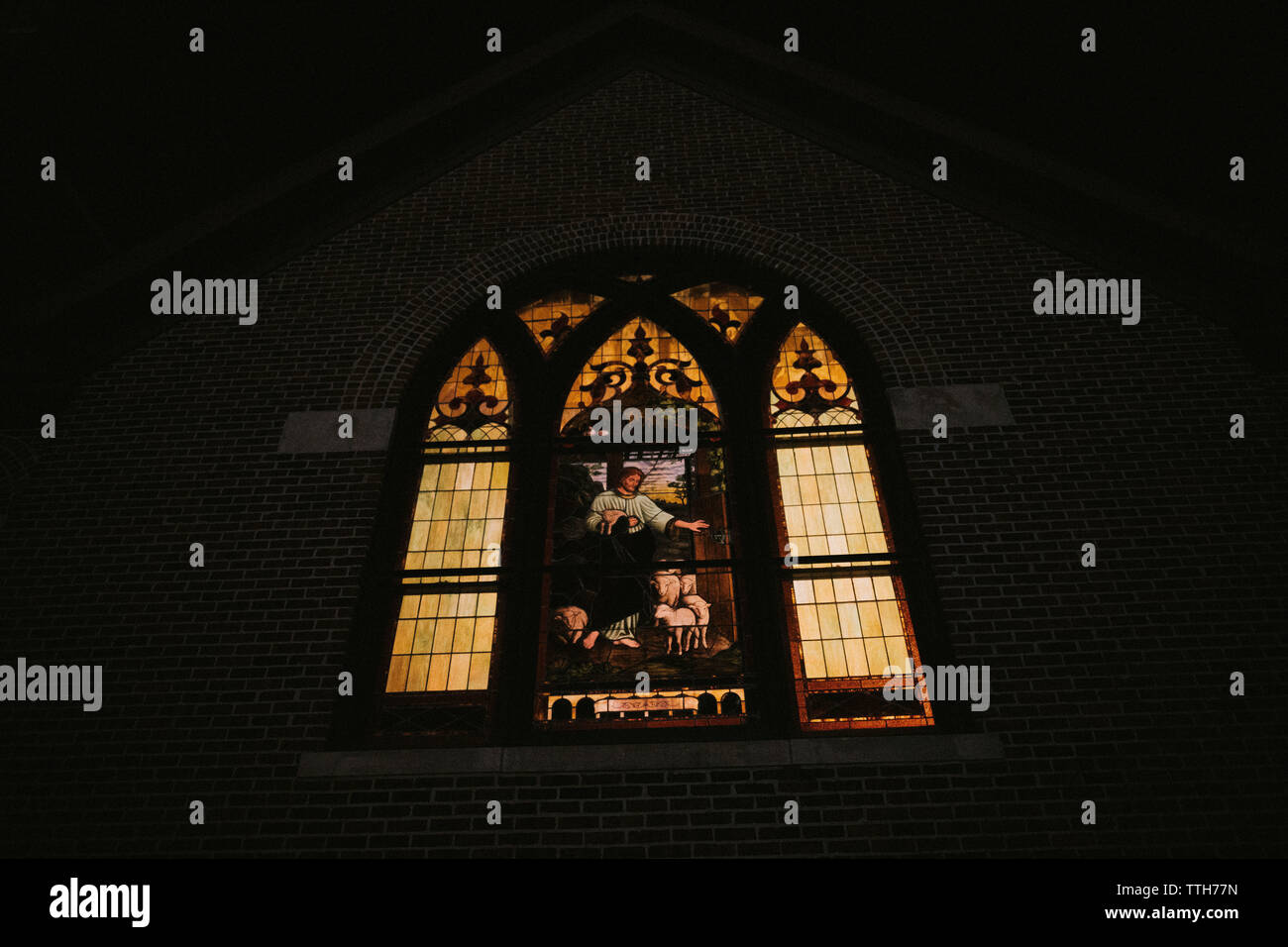 stained glass church windows at night Stock Photo - Alamy